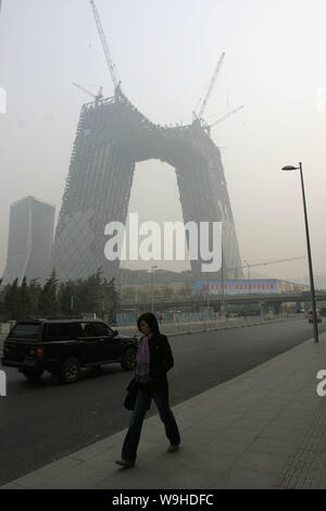 The leaning towers of the China Central Television headquarters loom ...