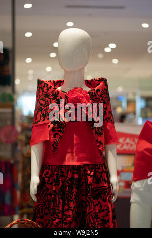 A colourful traditional womens costume of the Philippines known as a ...