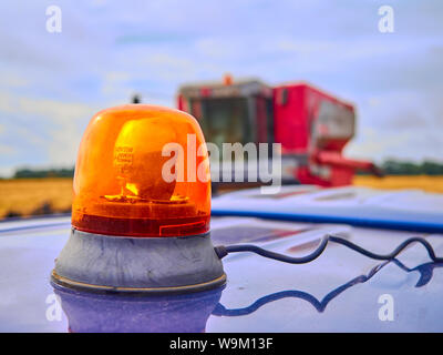 Flashing amber warning light on top of dumper truck Stock Photo - Alamy
