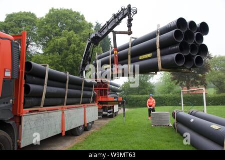 Pipes: semi-rigid, large bore PVC drainage pipes being delivered to ...