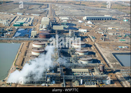 Aerial photo of operations at CNRL Muskeg River Mine oil sands facility ...