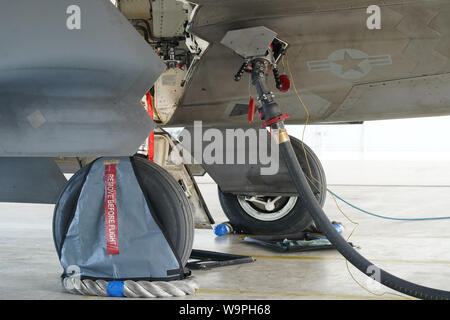 U.S. Air Force fuels specialists load parts of the aerial bulk fuel ...