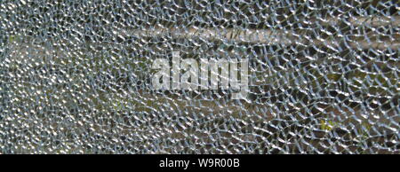 a fragmented car window made of safety glass Stock Photo - Alamy