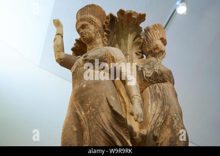 Ancient Greek statues on display at The Louvre Museum in Paris, France ...