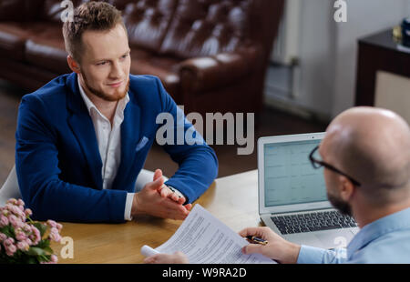 Confident man attending job interview Stock Photo - Alamy