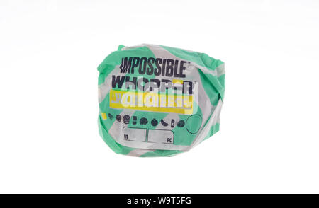 Burger King Whopper in wrapper on white background. Cut out Stock Photo ...