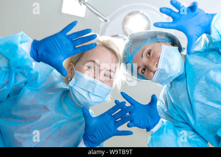 Crazy scary and funny doctors surgeons dentists in masks with gloves ...
