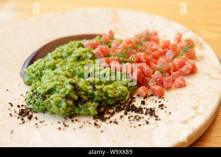 Bluefin tuna fillet, risotto with herbs and teriyaki sauce in marble ...