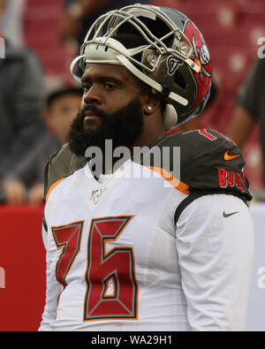 Miami Dolphins offensive tackle James Tunstall (75) reacts after an NFL ...