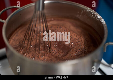 Hands of chef making pudding Stock Photo - Alamy