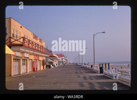 A scenic view of the beachfront and boardwalk at Rehoboth Beach ...