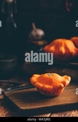 Raw pattypan squash on cutting board Stock Photo - Alamy