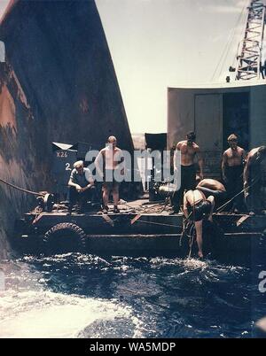 Bow of USS Pittsburgh (CA-72) under tow toward Guam in June 1945 Stock ...