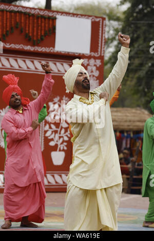 Male bhangra dancers performing at Surajkund Crafts Mela, Surajkund ...