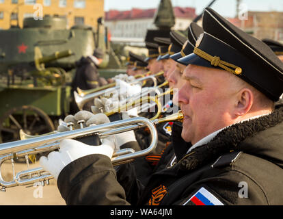 The Russian Army Band performs a march past the saluting base during a ...