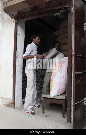 Poor people getting food at low cost from government rashan shop Stock ...
