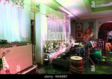 Musical instruments in restaurant stage Stock Photo - Alamy