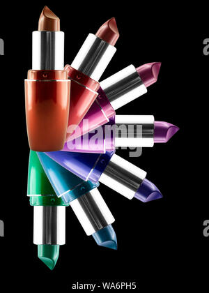 Multiple colored lipsticks isolated Stock Photo - Alamy