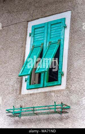 Blue and white shutter of a mountain hut, Rifugio San Marco, San Vito ...