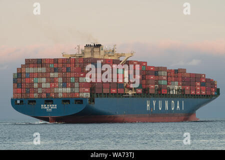 Hyundai Brave container ship shown departing the Port of Los Angeles ...