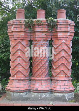 Ornate Tudor style chimney pots Stock Photo - Alamy