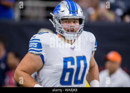 Detroit Lions center Graham Glasgow (60), guard Kayode Awosika (74 ...