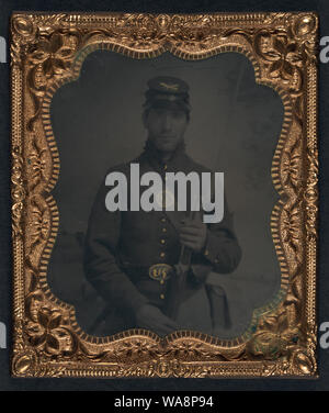 Captain Joseph W. Winger of Company D, 2nd Pennsylvania Heavy Artillery Regiment in uniform with ...