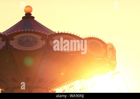 Paris carousel - Chair swing ride in amusement park at Tuileries garden ...