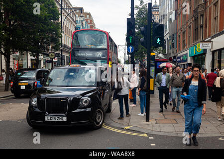A woman London taxi driver in London in England in Great Britain in ...