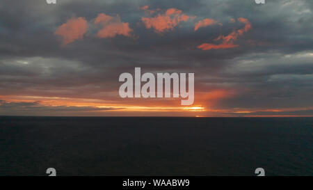 Bright colorful sunset over the sea, evening landscape Stock Photo - Alamy