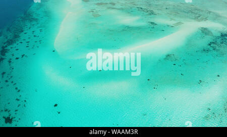 Sand bar in transparent turquoise water top view. Tropical beach with ...