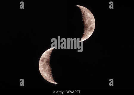 Two half Moons close up concept. Black deep cosmos space background ...