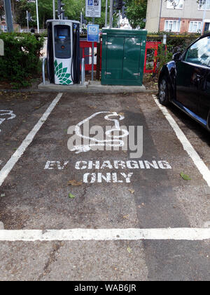 Car park with signage designated for EV cars at charging station Stock ...