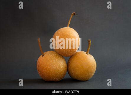 Pyramid formed by fresh Nashi or Asian pears isolated on white ...