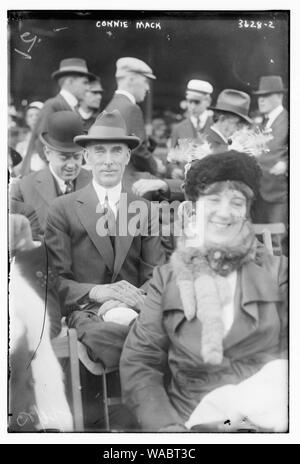 Connie Mack, manager of the Philadelphia Athletics, dresses up in a ...