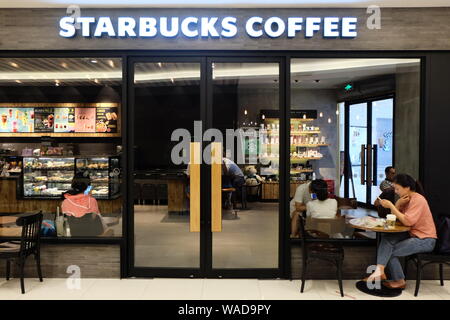 The very first Starbucks coffee shop which opened in 1971 in Seattle ...