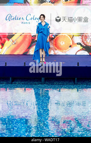 Chinese singer-songwriter Jane Zhang wore white ink-printed shirt and ...