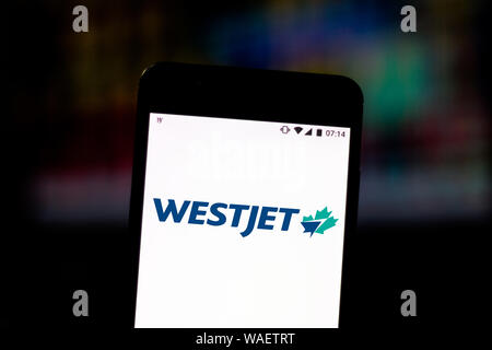 In this photo illustration the WestJet Airlines Ltd. logo is seen ...