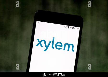 In this photo illustration, the Xylem logo is seen displayed on a ...