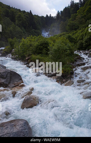 Waterfall and rushing river of the Gave de Lutour from l'Abri du ...