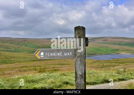 A Pennine Way sign post on a snow covered Pen-y-ghent, in the Yorkshire ...