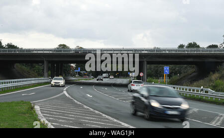 Zetel, Germany. 20th Aug, 2019. Cars pass under the bridge of the A29 ...