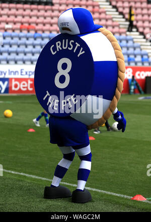 Wigan Athletic mascot Crusty The Pie entertaining fans before the game ...