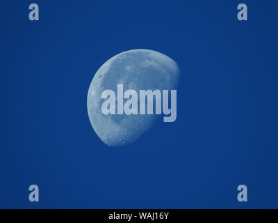 a very dense close-up of a decreasing moon in the morning sky Stock ...