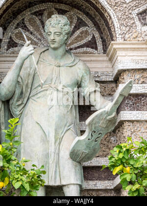 Statue of Orpheus. The Organ fountain, 1566, housing organ pipies ...