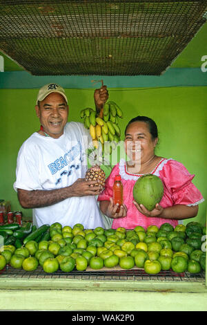 Kosrae, Micronesia (FSM). Local Kosrae man and his son at a traditional ...