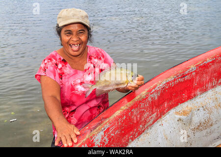 Kosrae, Micronesia (FSM). Local woman braiding her daughters hair in ...