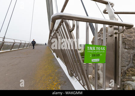 samaritans poster on bridge footpath across M20 motorway, Ashford, Kent ...