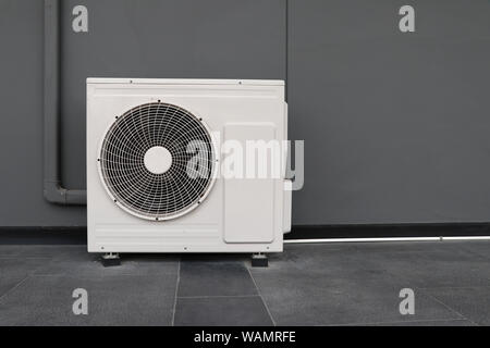 The air conditioner condensing unit (CDU) with twin fans Stock Photo ...