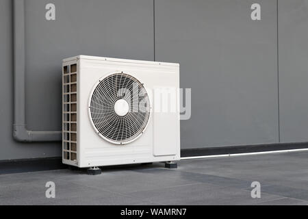 The air conditioner condensing unit (CDU) with twin fans Stock Photo ...